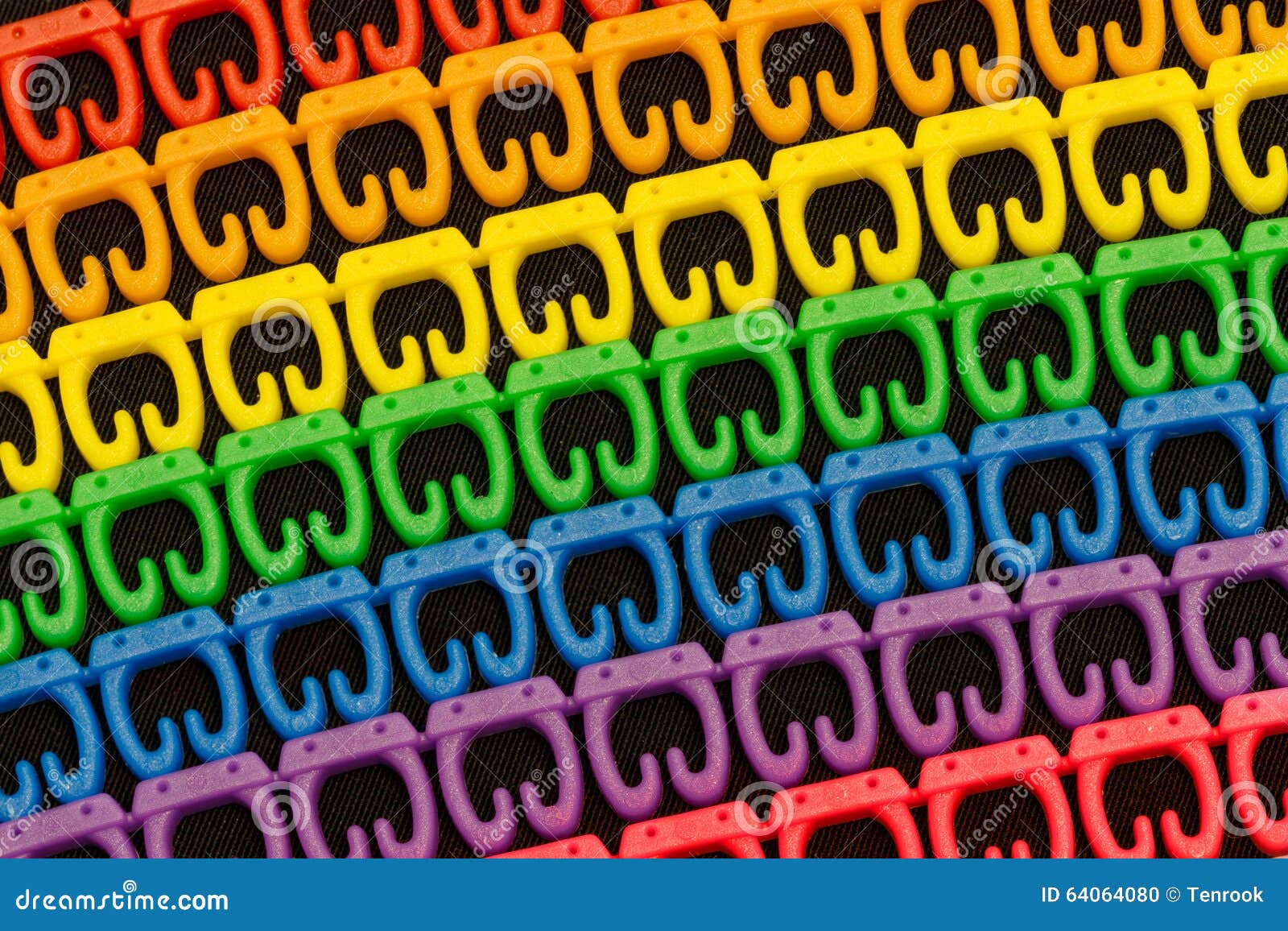 Plastic Tag for Cable Colors of the Rainbow on a Black Background Stock ...