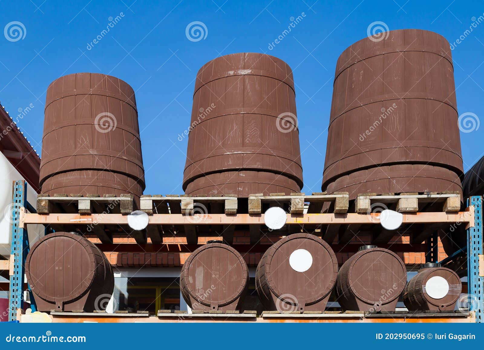 Plastic Tanks and Barrels of Various Capacities Stock Image - Image of ...