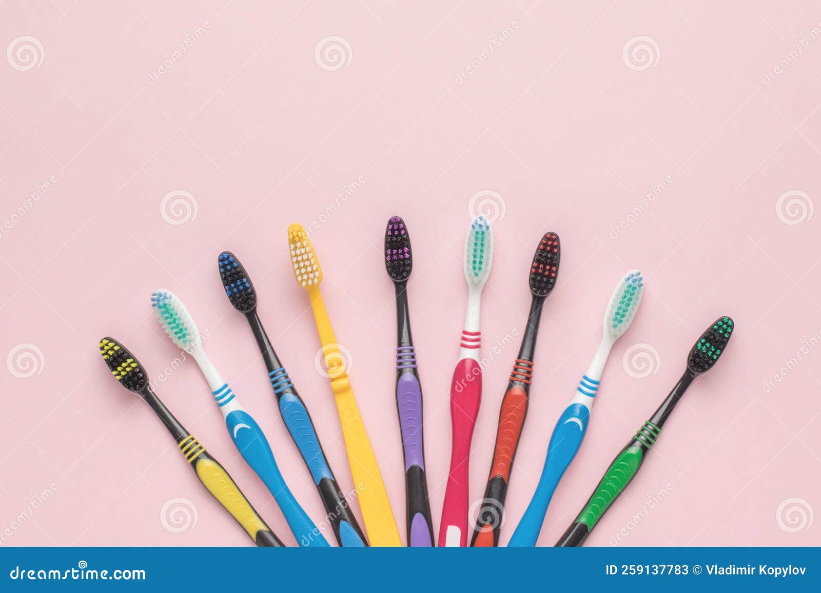 Plastic Toothbrushes on a Light Pink Background. Flat Lay Stock Image ...