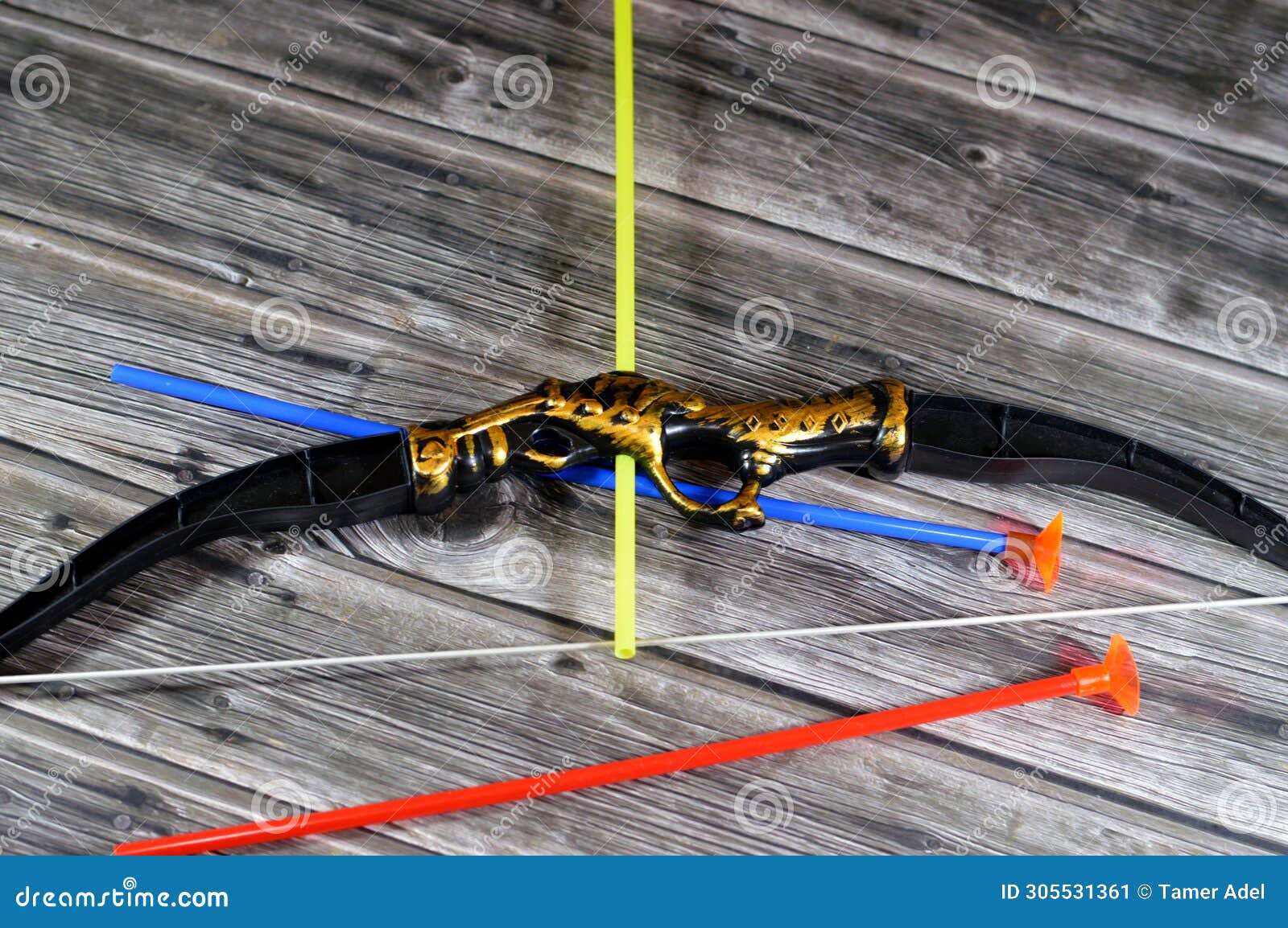 A Plastic Toy of a Bow and Arrows, Archery, the Bow and Arrow is a ...