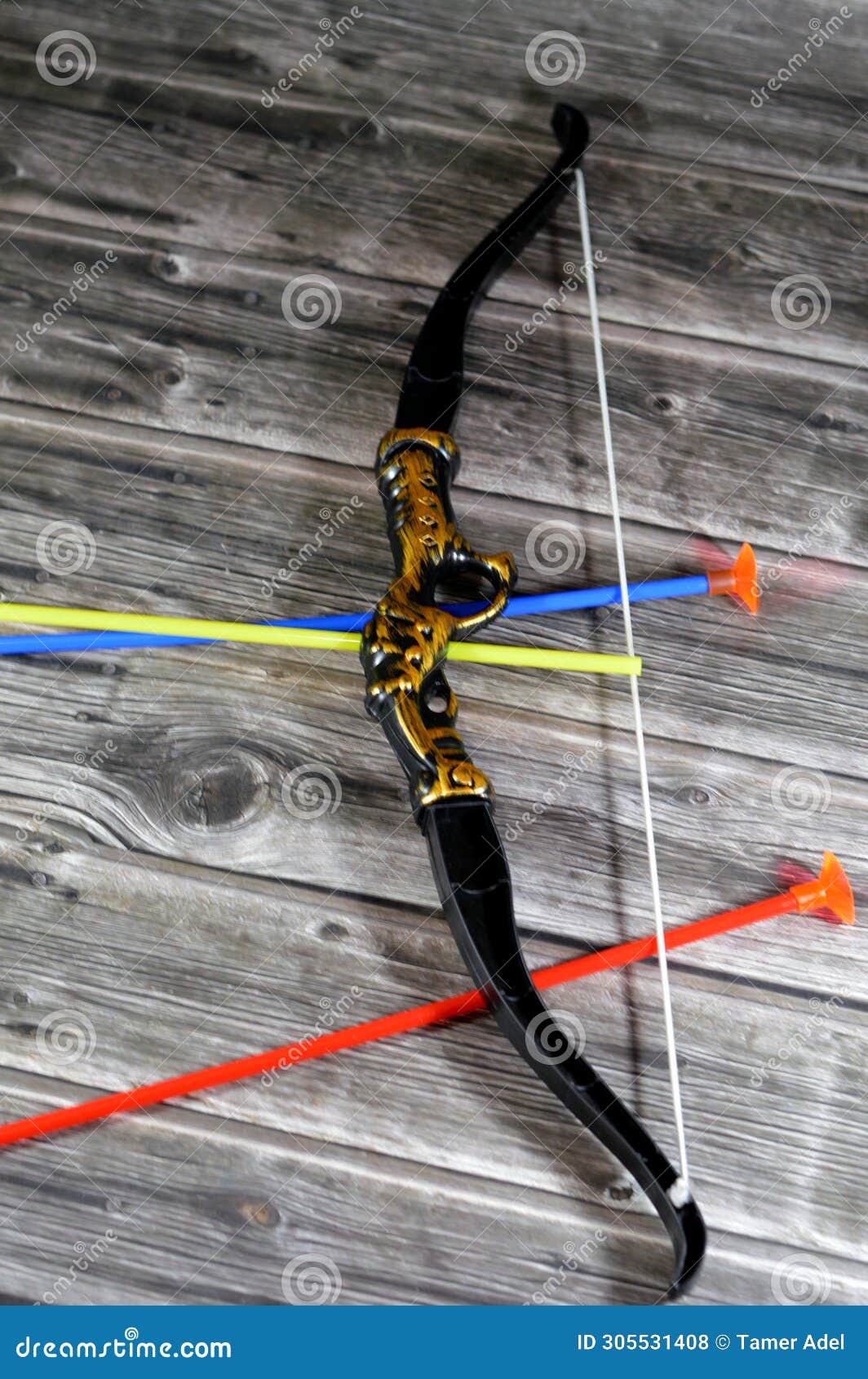 A Plastic Toy of a Bow and Arrows, Archery, the Bow and Arrow is a ...