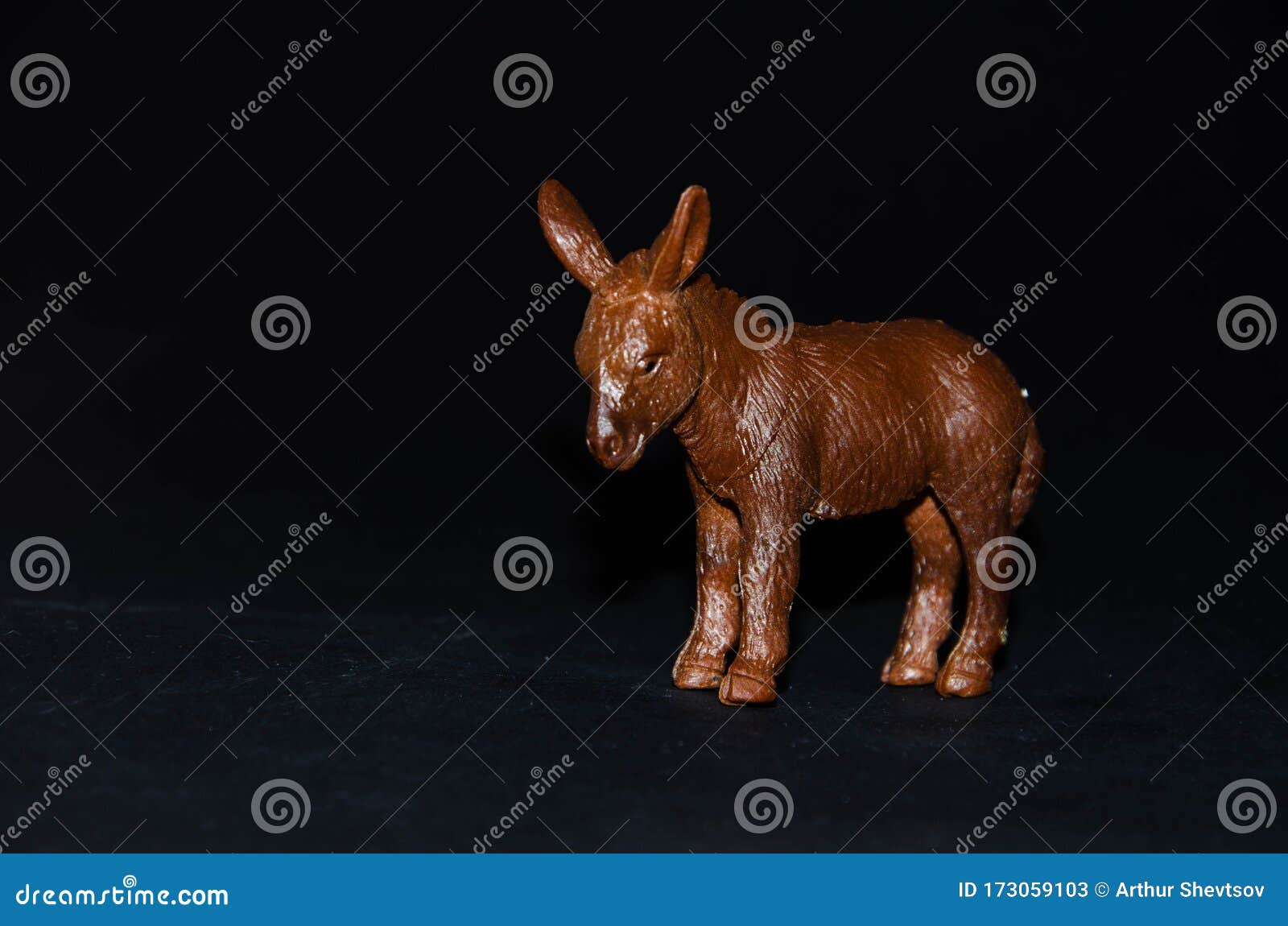 Plastic Toy Donkey On A Black Background. Realistic Toy Copy Space ...