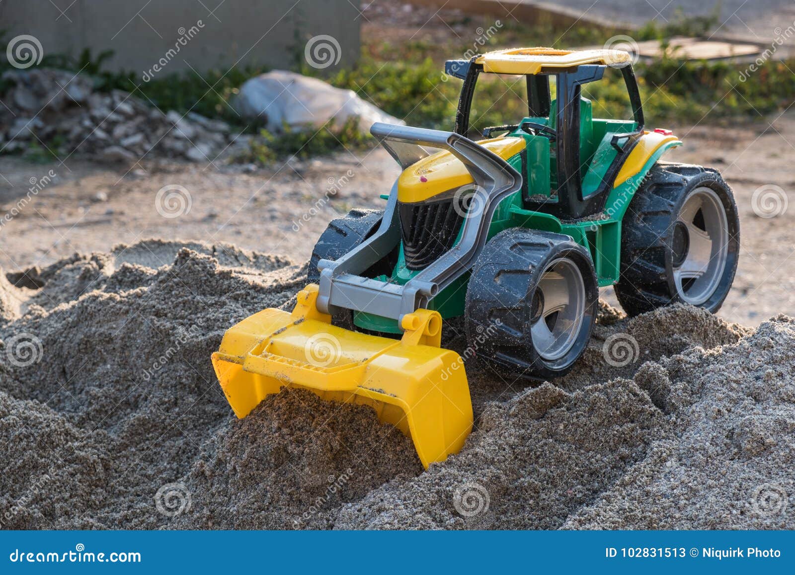 Plastic Toy Front Loader on the Sand Pile Editorial Stock Photo - Image ...