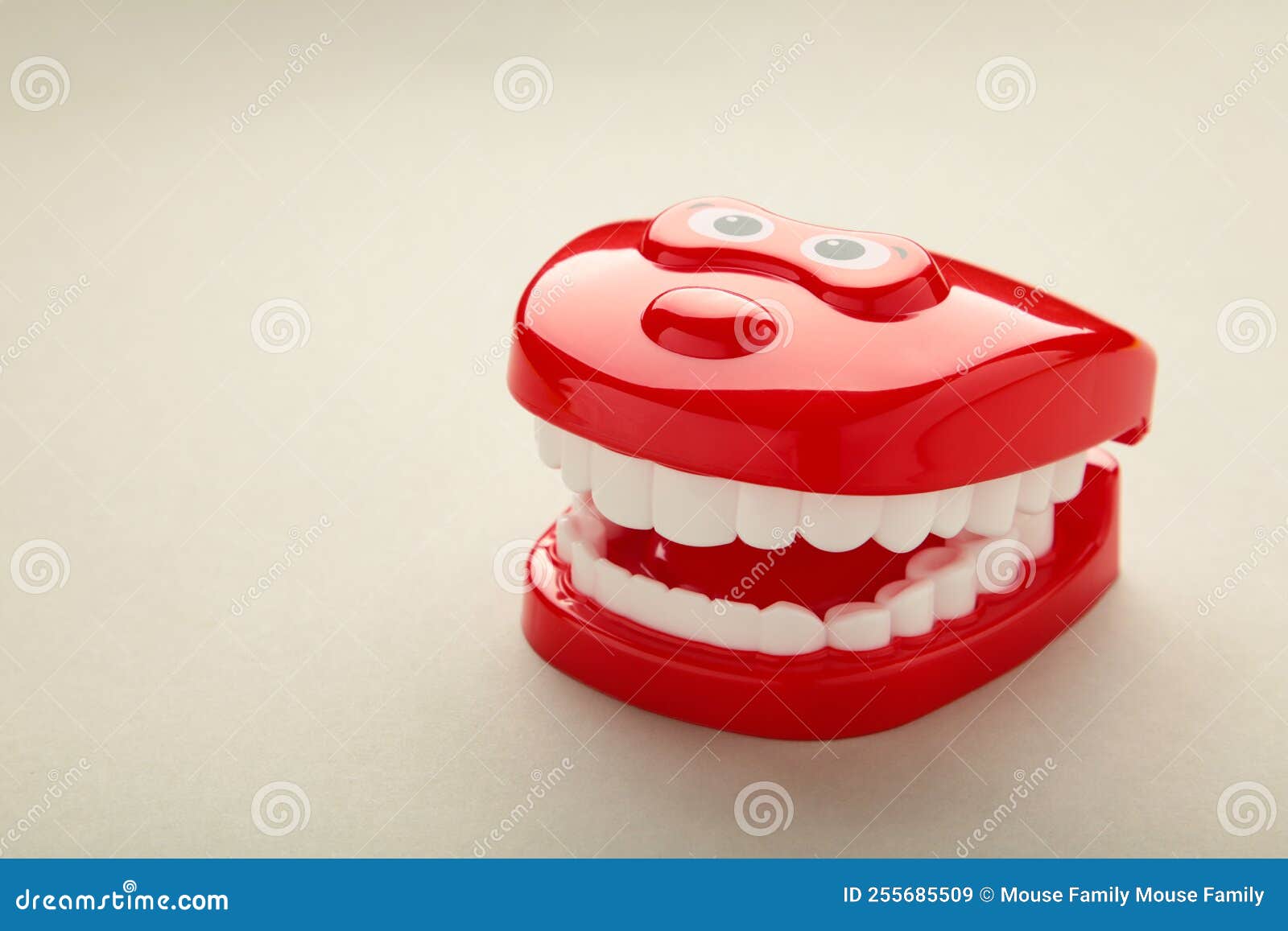 Plastic Toy Teeth on Grey Background. Abstract Minimal Composition ...