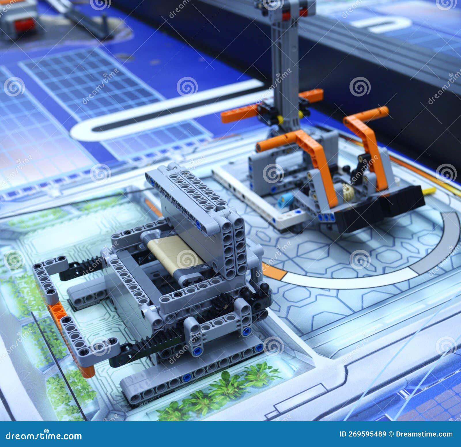 Plastic Toys Robots Assembled of Plastic Blocks Set on a Table for ...