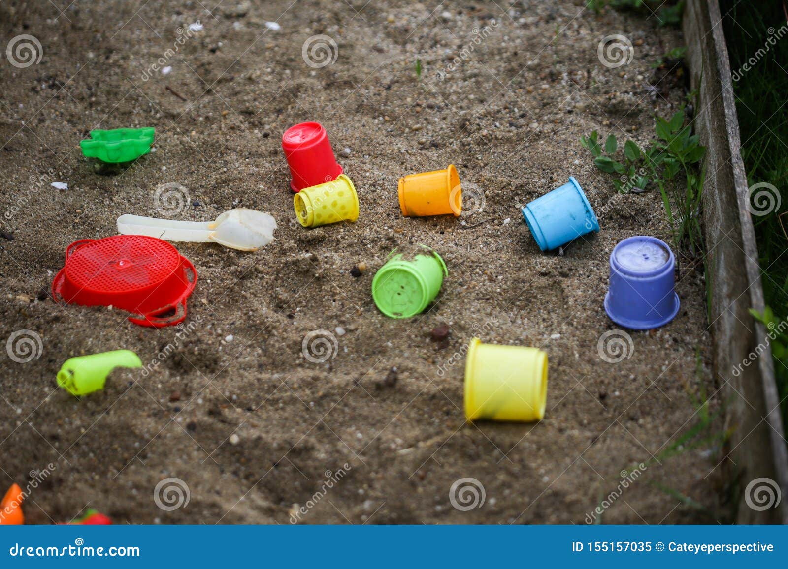 Plastic Toys in a Wet Sand Pit during a Rainy Day Stock Image - Image ...