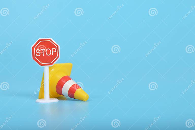 Plastic Traffic Cone and Stop Sign. Copy Space for the Text Stock Photo ...