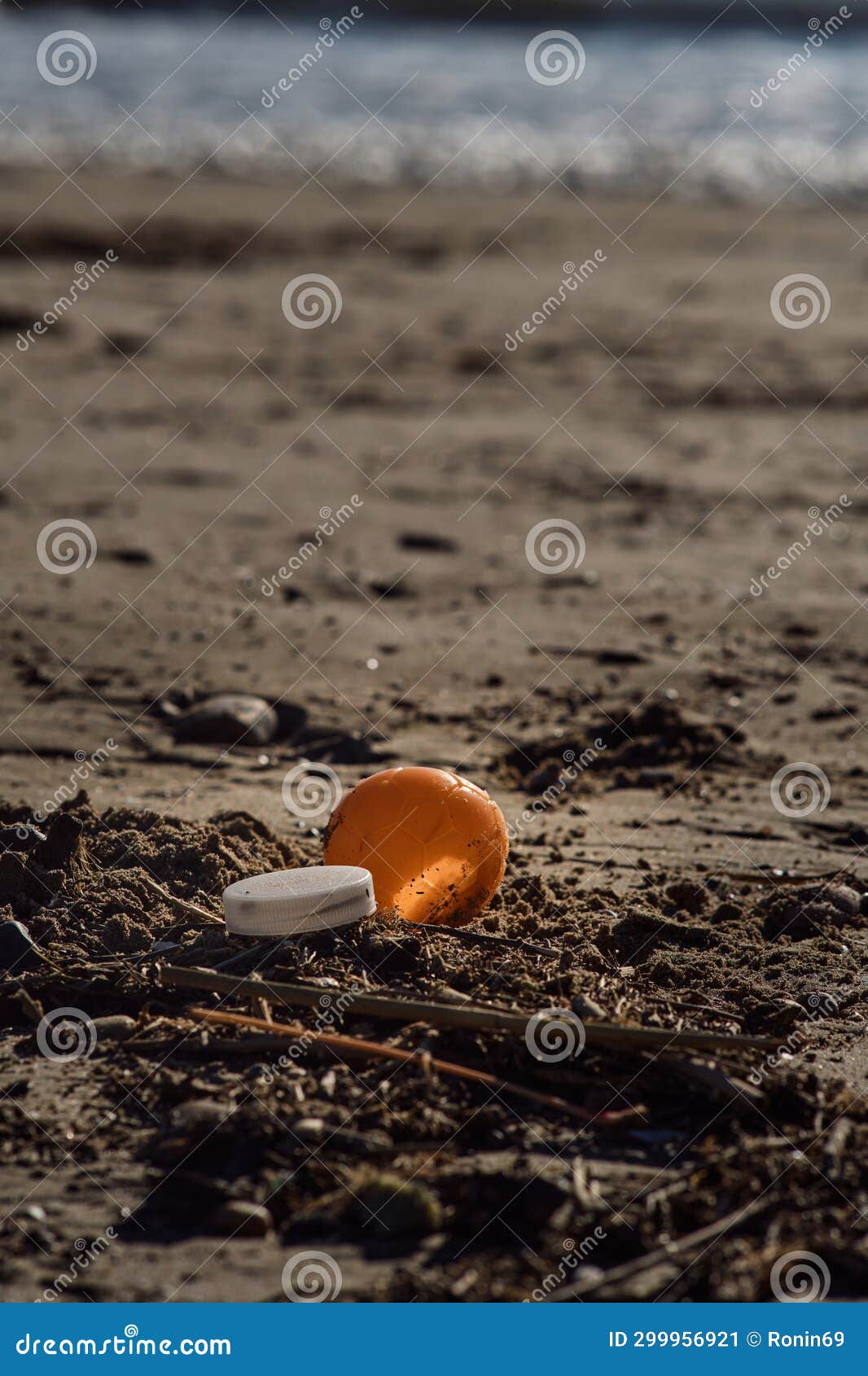Plastic trash on the beach stock image. Image of ocean - 299956921