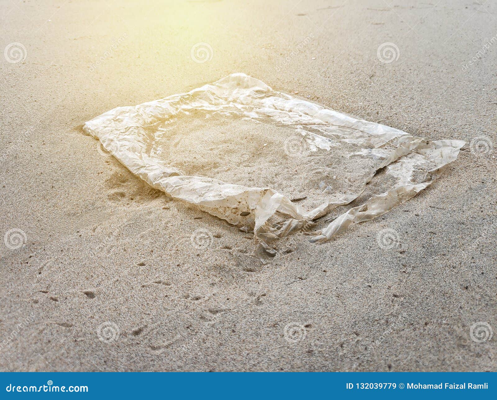 Plastic Trash or Garbage by the Beach with Sun Flare. Pollution and ...