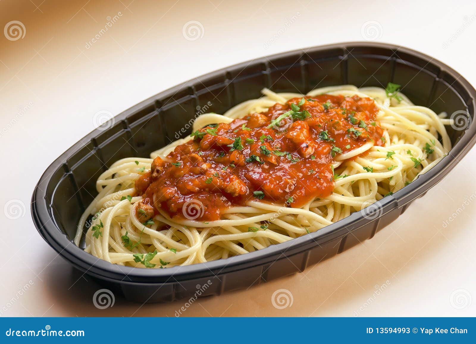 Plastic tray of Spaghetti stock image. Image of green - 13594993