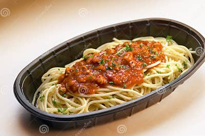Plastic tray of Spaghetti stock image. Image of green - 13594993