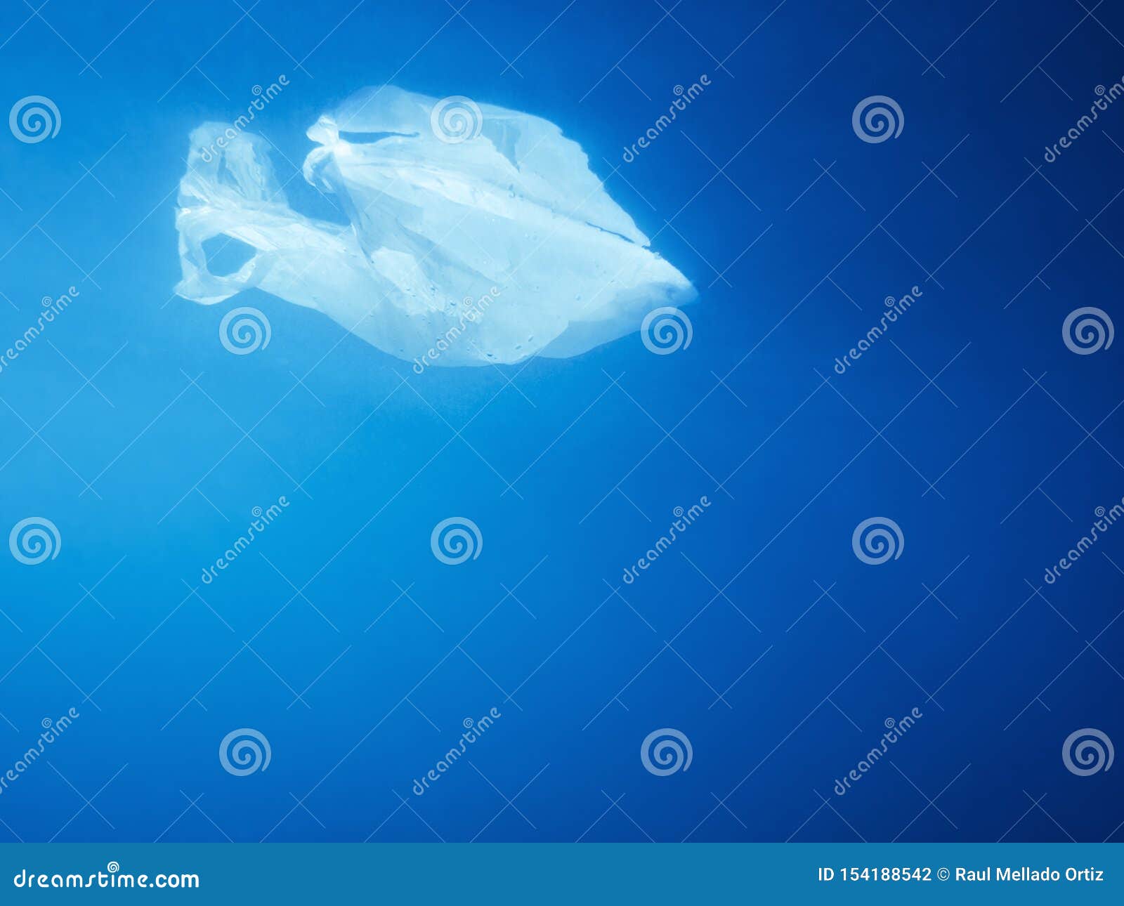 Plastic Bag Floating Under the Ocean Water Stock Photo - Image of ...