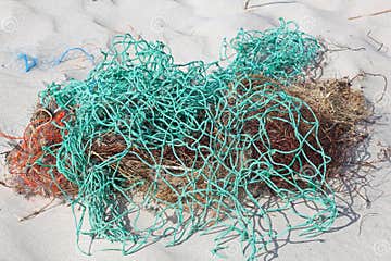 Plastic Waste and Residues of Nets on the Beach Stock Image - Image of ...
