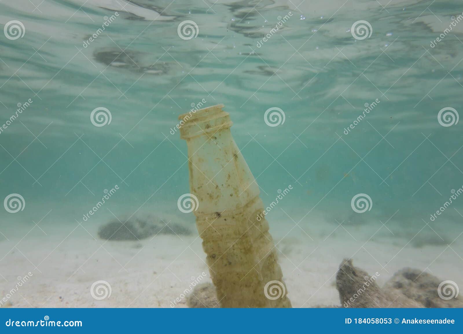 Plastic waste in the sea stock image. Image of debris - 184058053