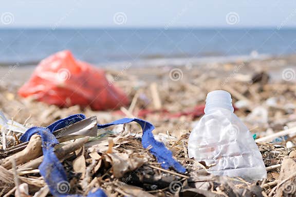 Plastic Waste and Trash on Sandy Beach. Environmental Pollution Problem ...