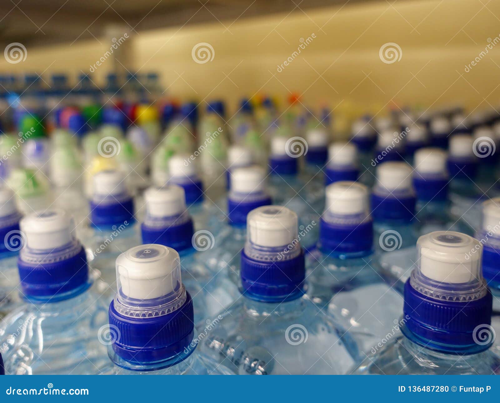 Plastic Water Bottles with Caps of Different Colour. Stock Photo ...