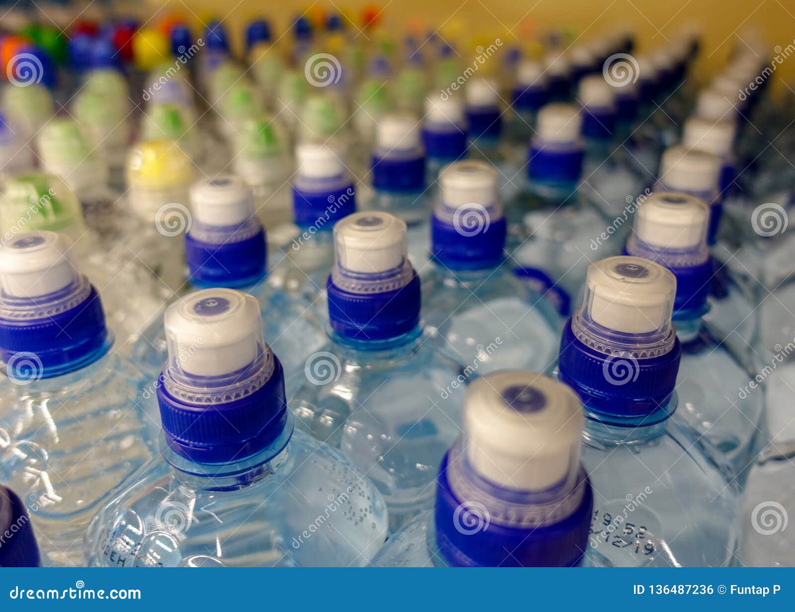 Plastic Water Bottles with Caps of Different Colour. Stock Photo ...