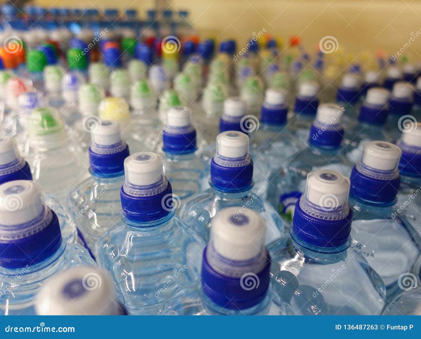 Plastic Water Bottles with Caps of Different Colour. Stock Image ...