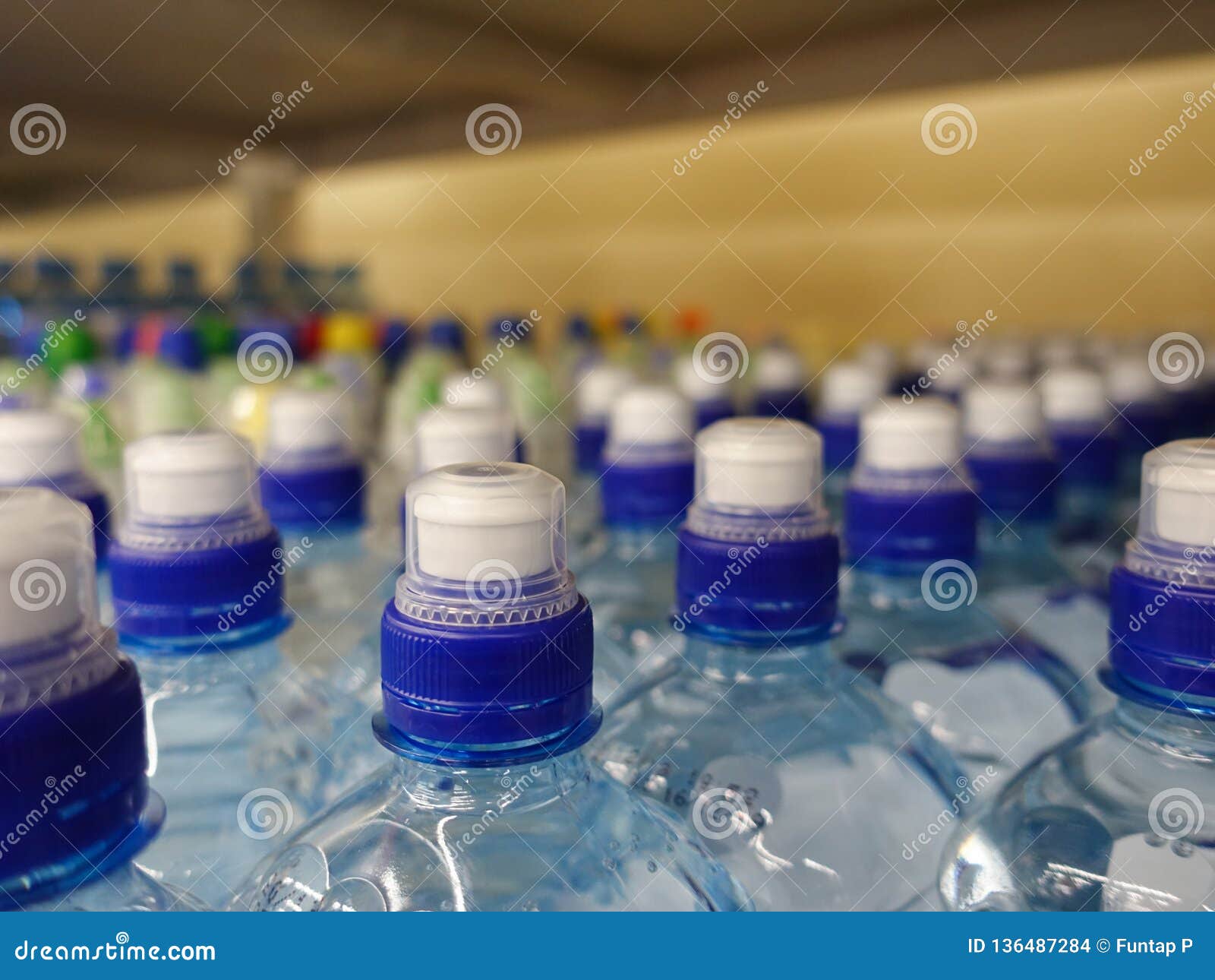 Plastic Water Bottles with Caps of Different Colour. Stock Photo ...