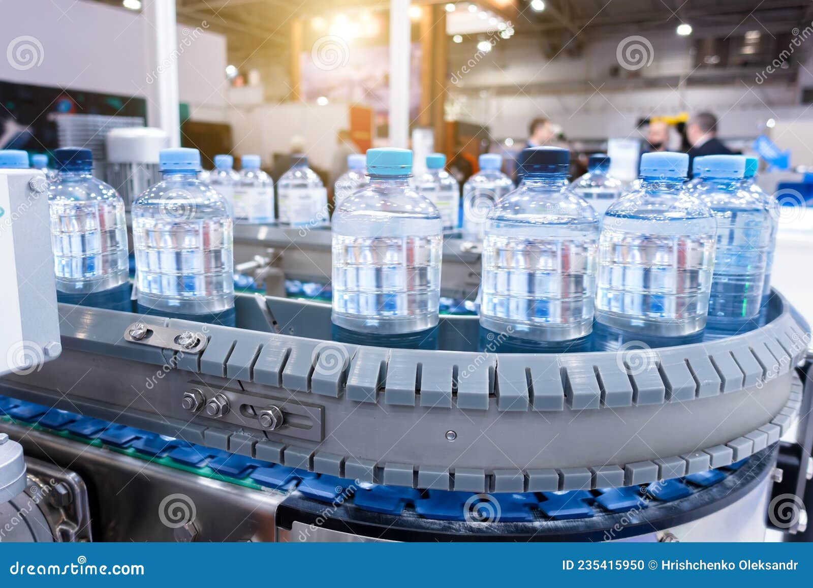 Plastic Water Bottles Move Along the Conveyor Belt Stock Photo - Image ...