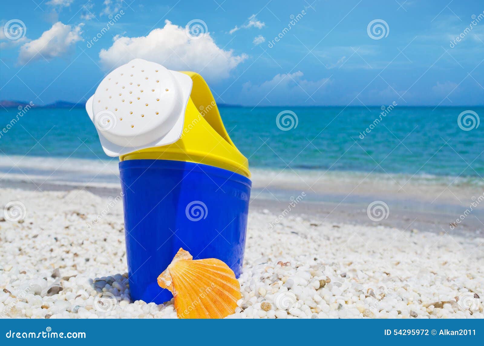 Plastic Watering Can by the Sea Stock Photo - Image of summer, vacation ...