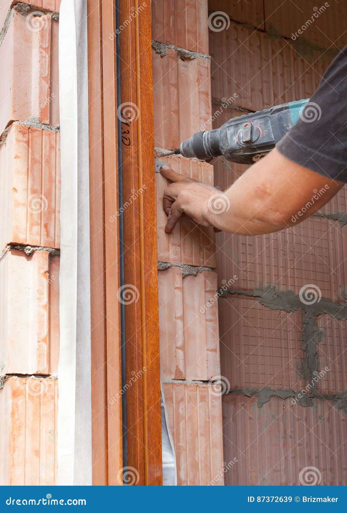 Plastic Window Installation. Worker Drills a Hole for the Screw. Stock ...