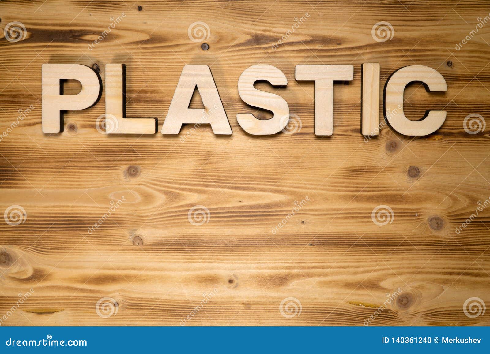 PLASTIC Word Made of Wooden Block Letters on Wooden Board Stock Photo ...