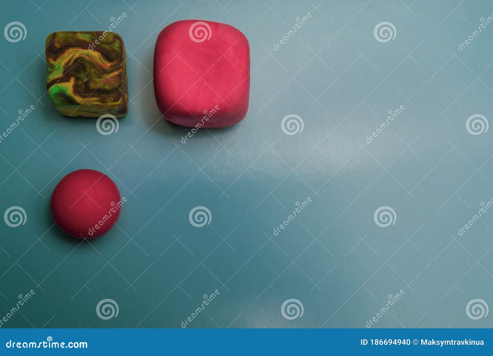 Plasticine Cubes and Balls on a Blue Background Stock Photo - Image of ...
