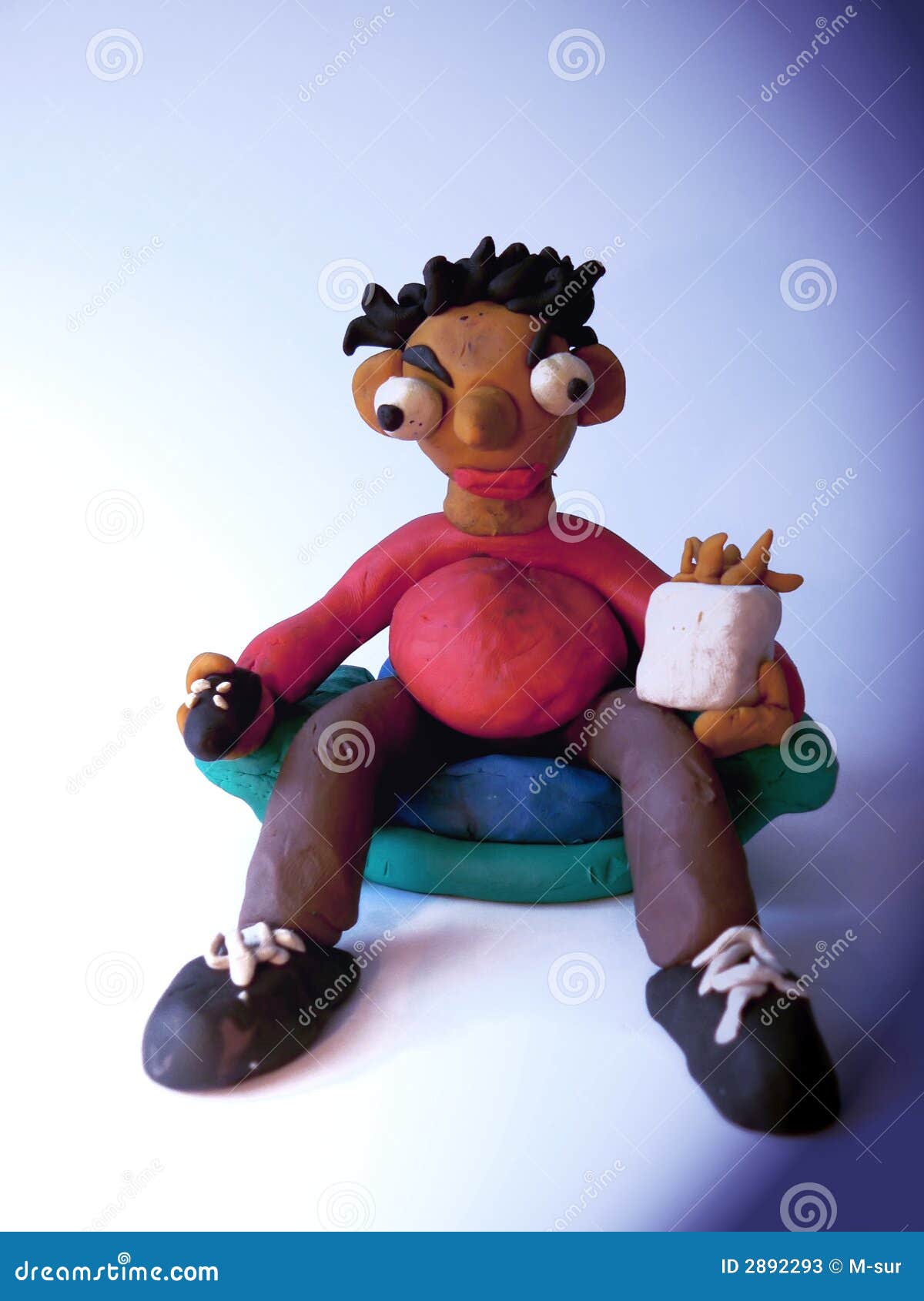 Plasticine man watching TV stock image. Image of entertainment - 2892293