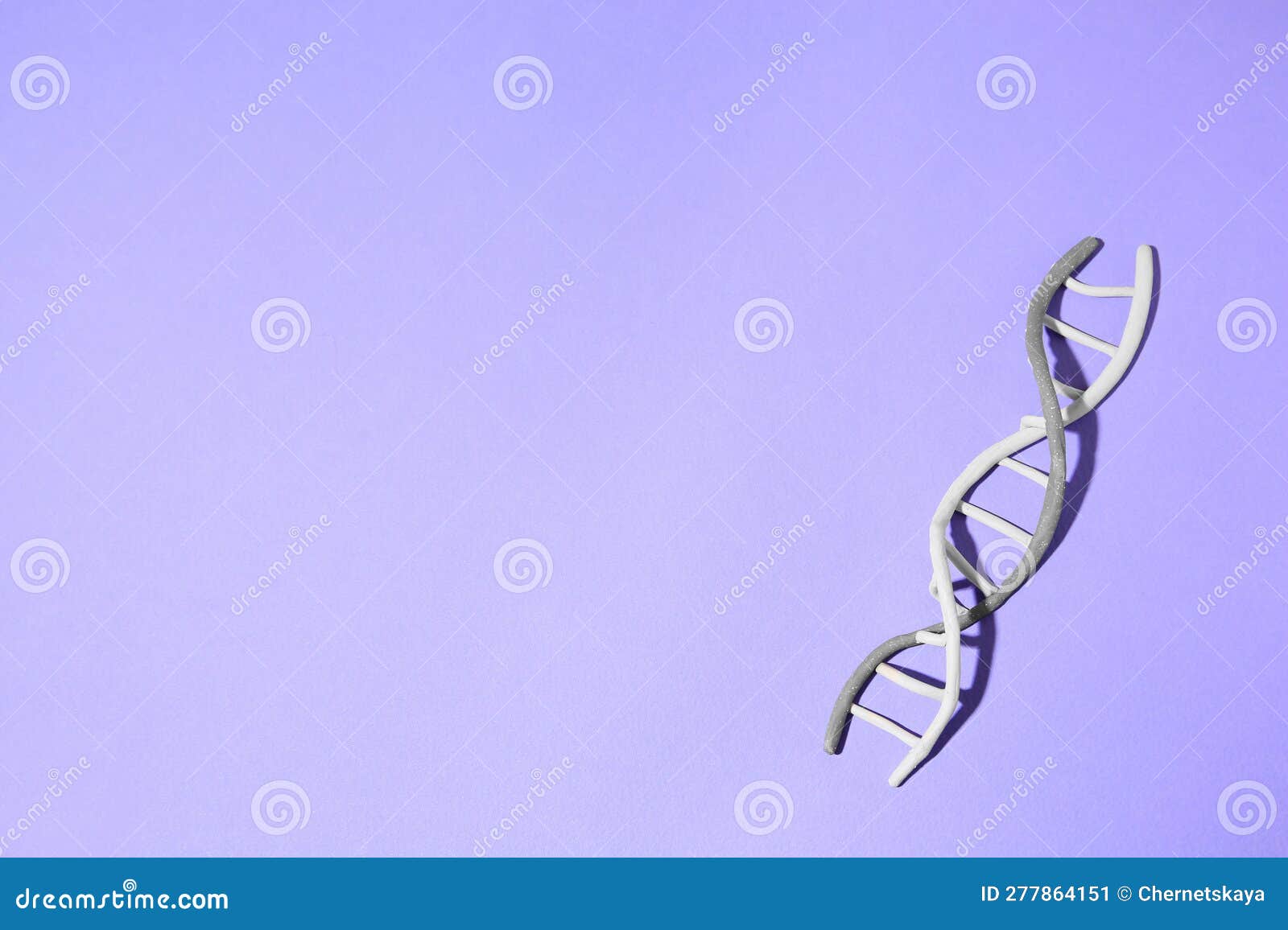 Plasticine Model of DNA Molecular Chain on Violet Background, Top View ...