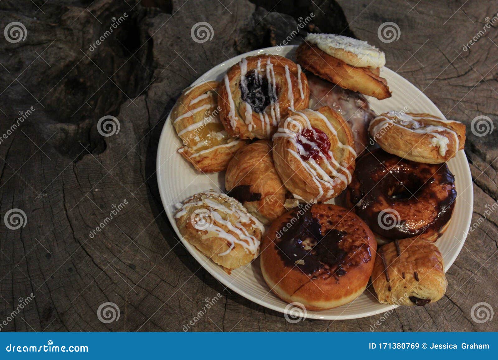 A Plate of Assorted Donuts and Pastries Stock Image - Image of flaky ...