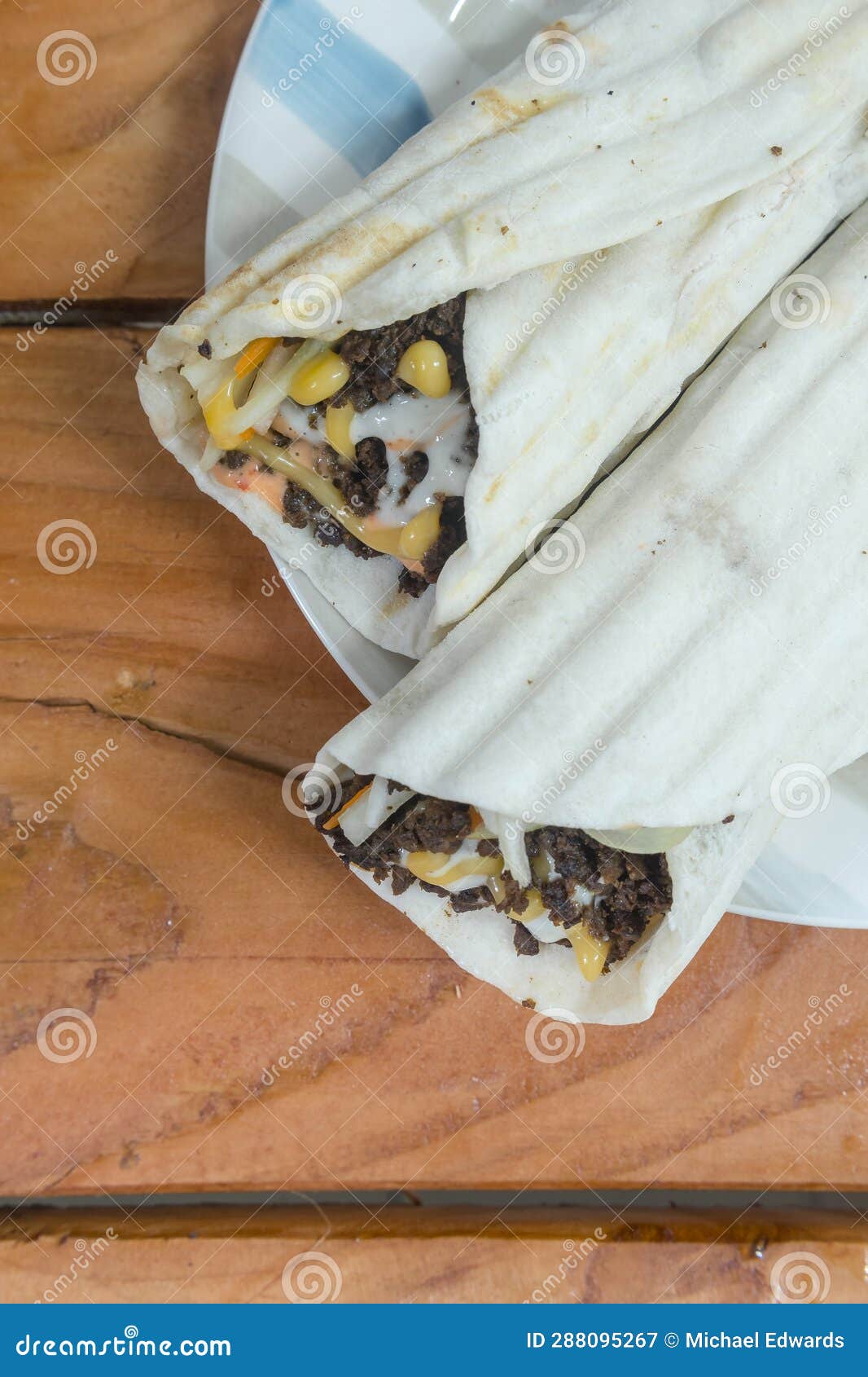 A Plate of Beef Shawarma Wrapped in Pita Bread Stock Image - Image of ...