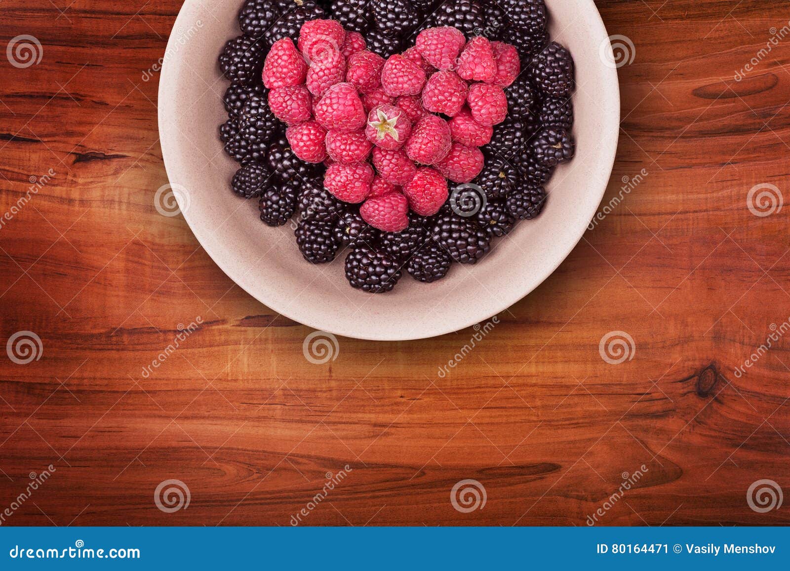Plate with Berries on the Wooden Table Stock Image - Image of texture ...