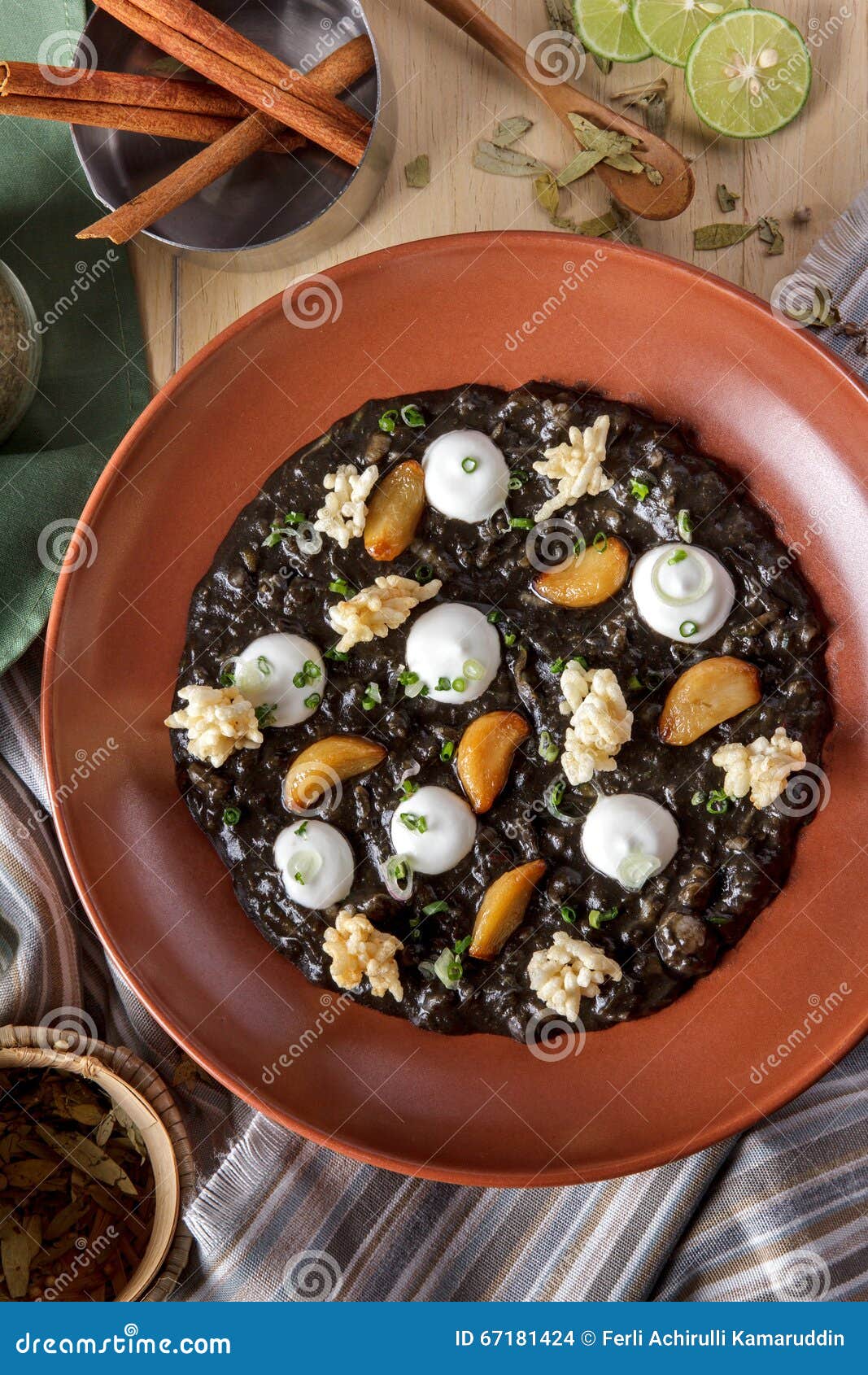 A Plate of Black Squid Risotto Stock Photo - Image of risotto ...