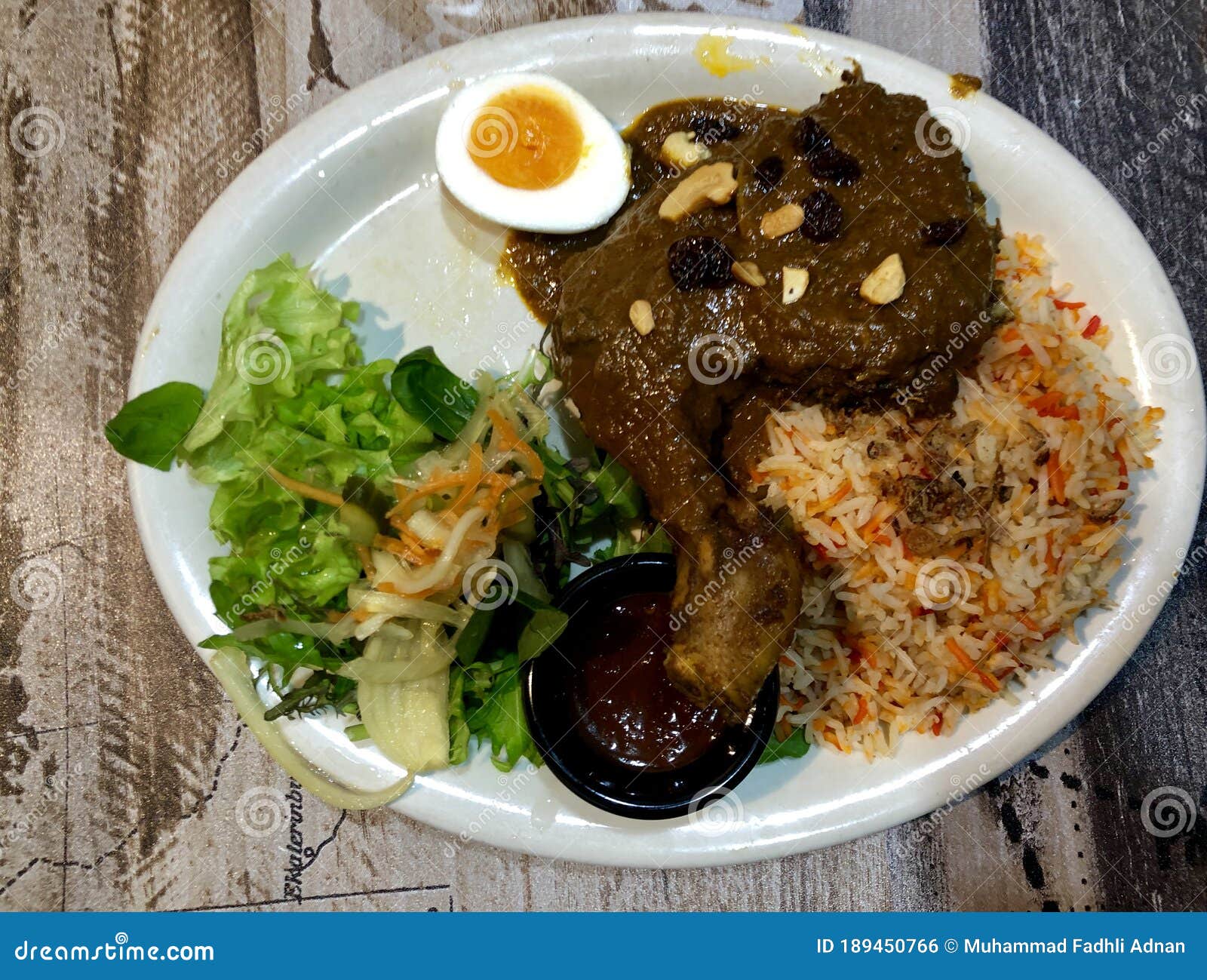 A plate of chicken Biryani stock photo. Image of bowl - 189450766