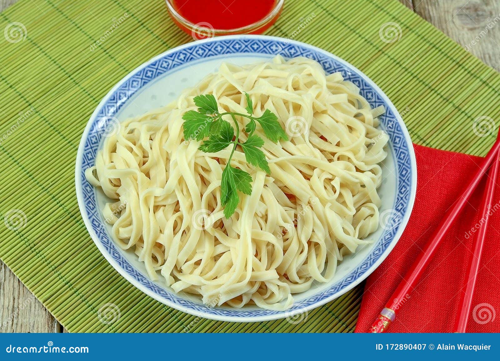 Chinese noodles on a plate stock image. Image of buttery - 172890407