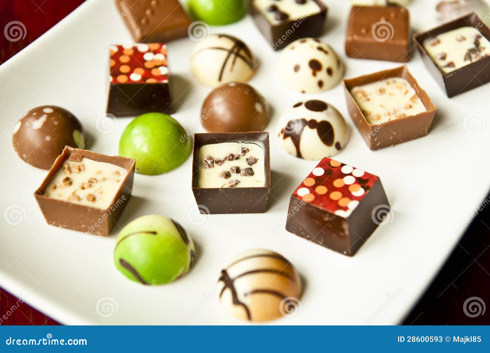 Plate of chocolates stock image. Image of white, luxury - 28600593