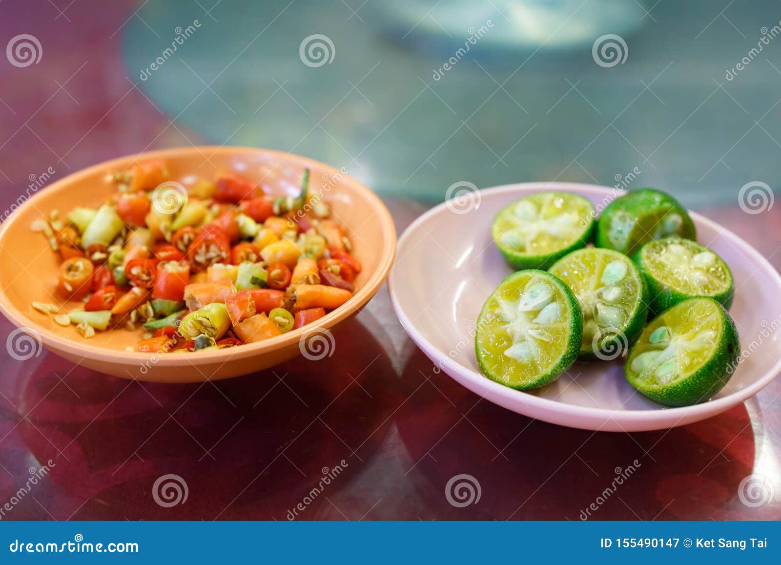 Plate of Chopped Chilli and Plate of Cut Limes Stock Image - Image of ...