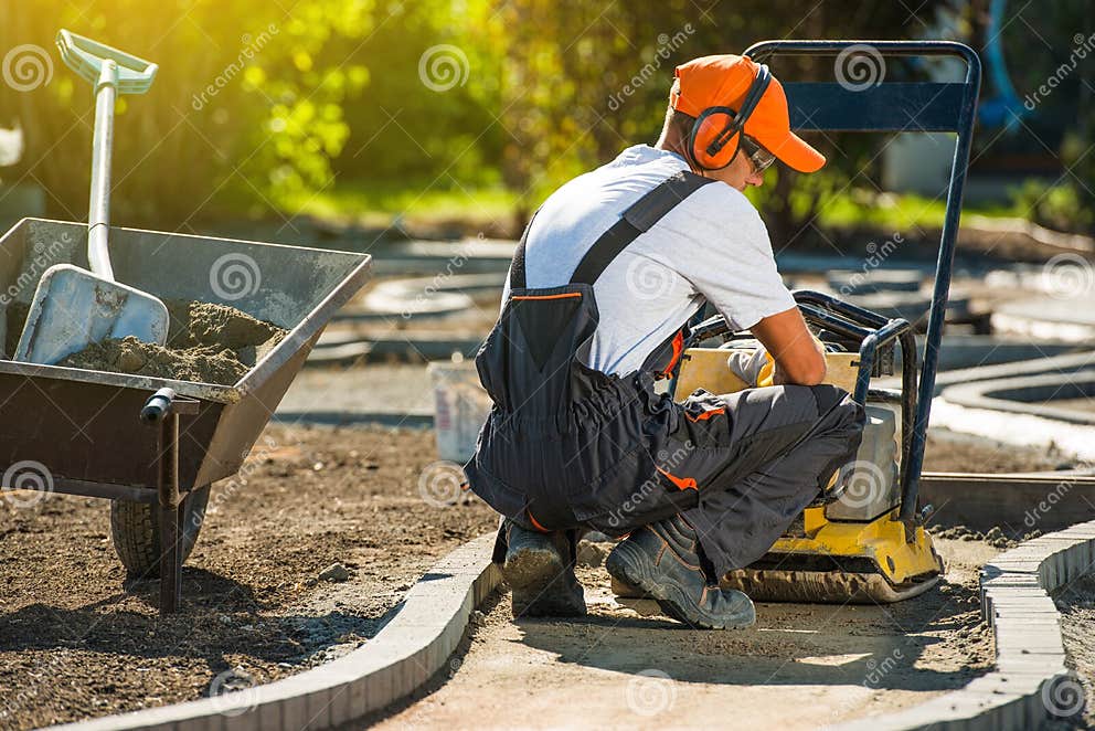Plate Compactor Brick Works Stock Photo - Image of roadway, park: 73783936