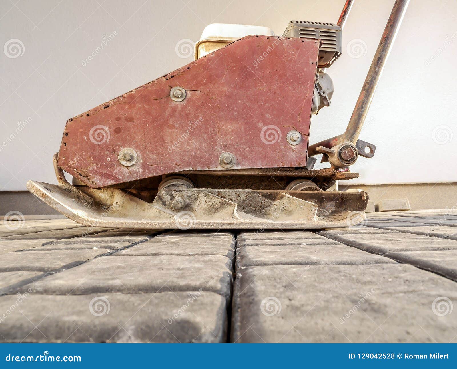 Plate Compactor on Paving Blocks Stock Photo - Image of compacting ...