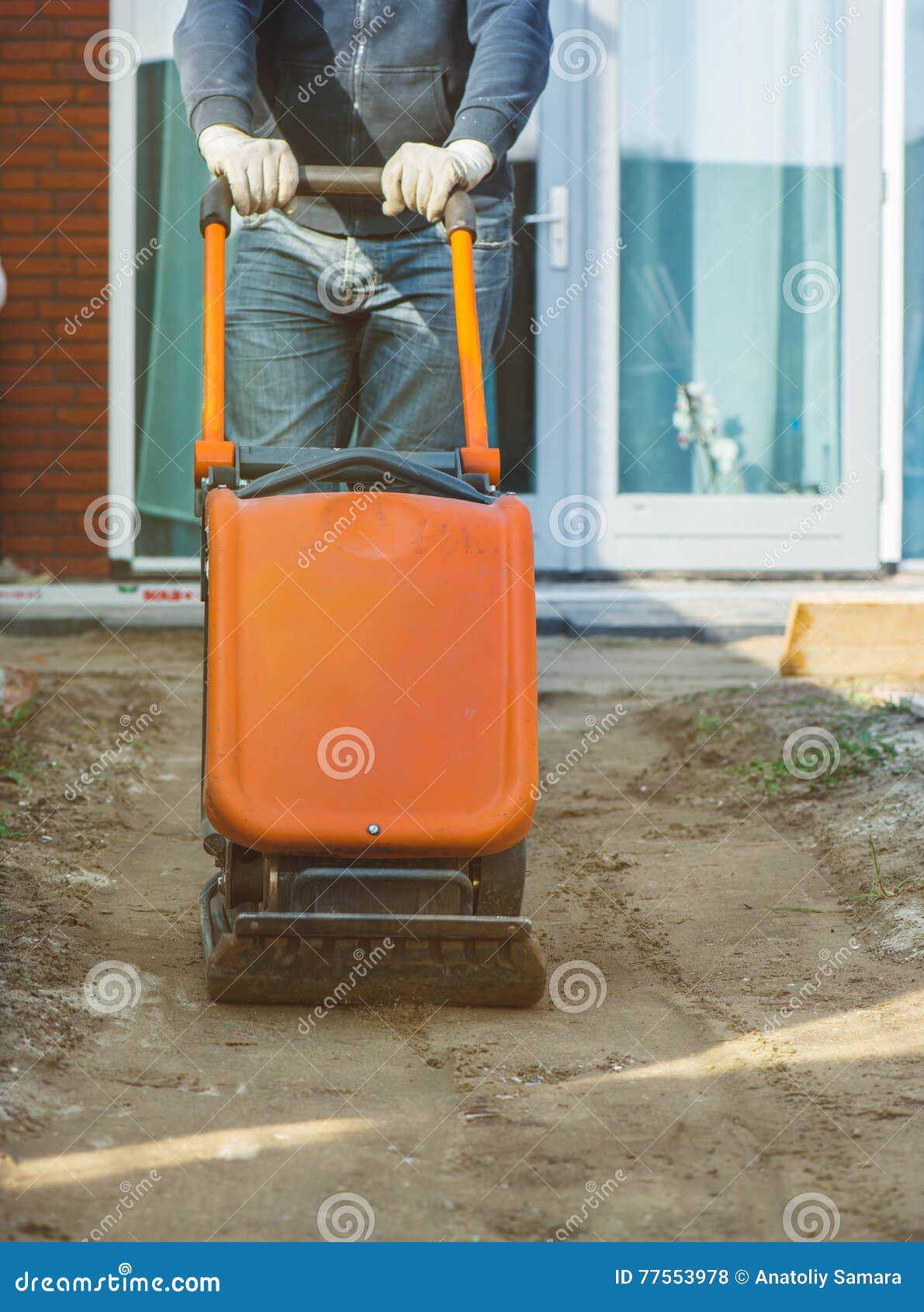 Plate Compactor for Sandstone Paving Stock Photo - Image of plate, work ...