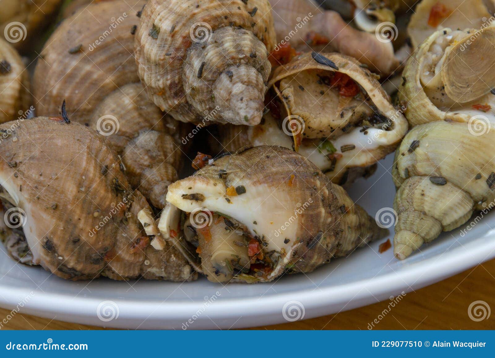 Plate of Cooked Whelks on a Table Stock Photo - Image of cooked, whelk ...