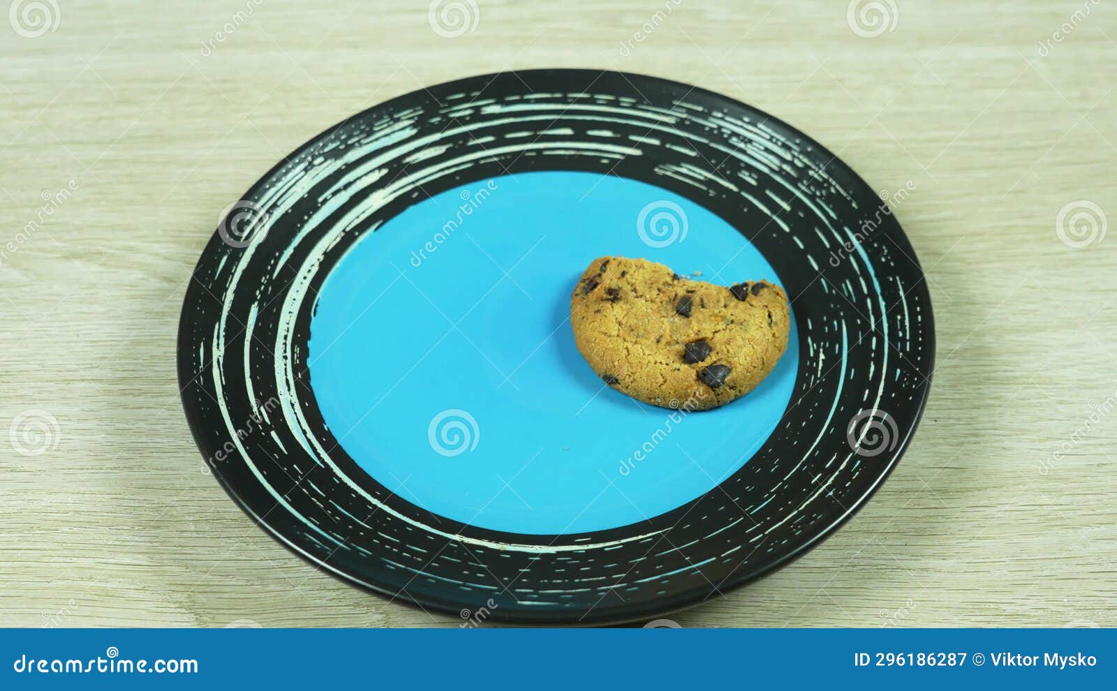 A Plate with Cookie Appears on the Table and the Cookie is Eaten Stock ...