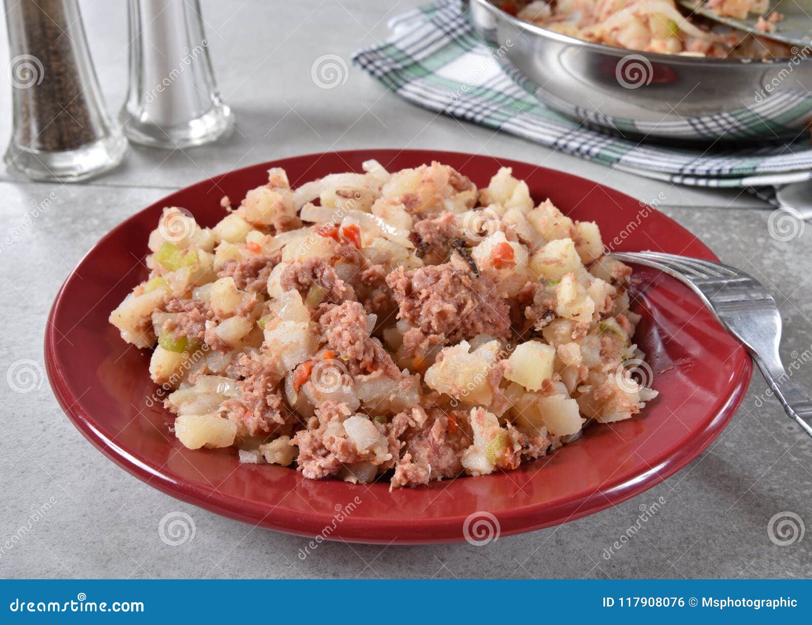 Plate of corned beef hash stock photo. Image of fork - 117908076