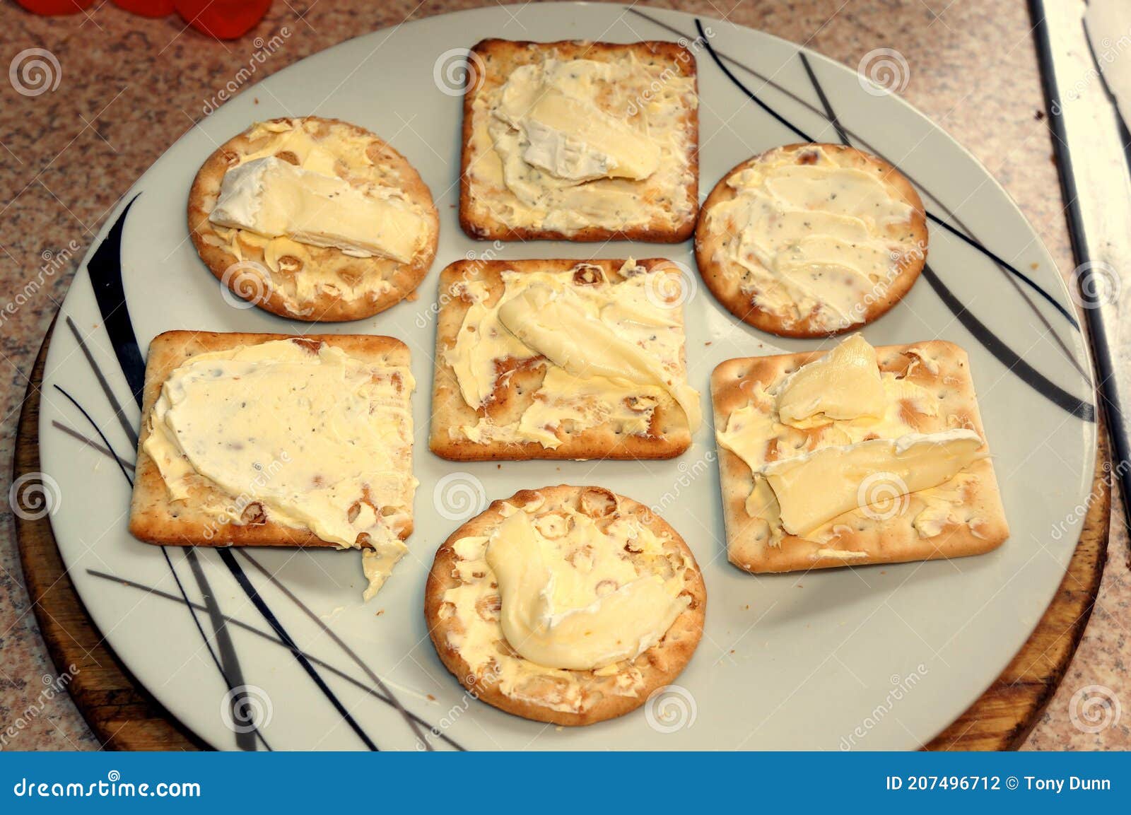 A plate of cream crackers stock photo. Image of cream - 207496712