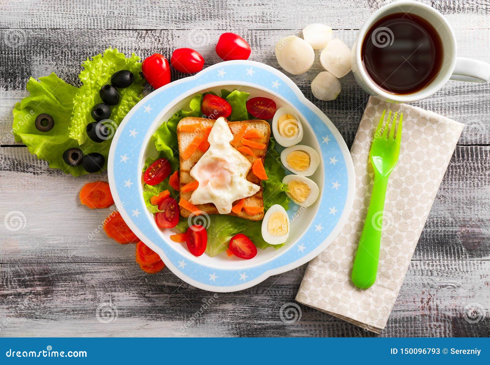 Plate with Creative Toast for Child and Cup of Tea on Wooden Table ...