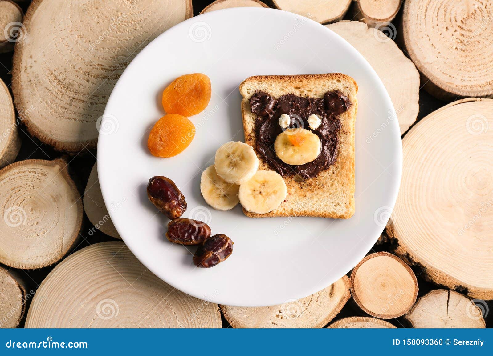 Plate with Creative Toast for Child on Wooden Table Stock Photo - Image ...