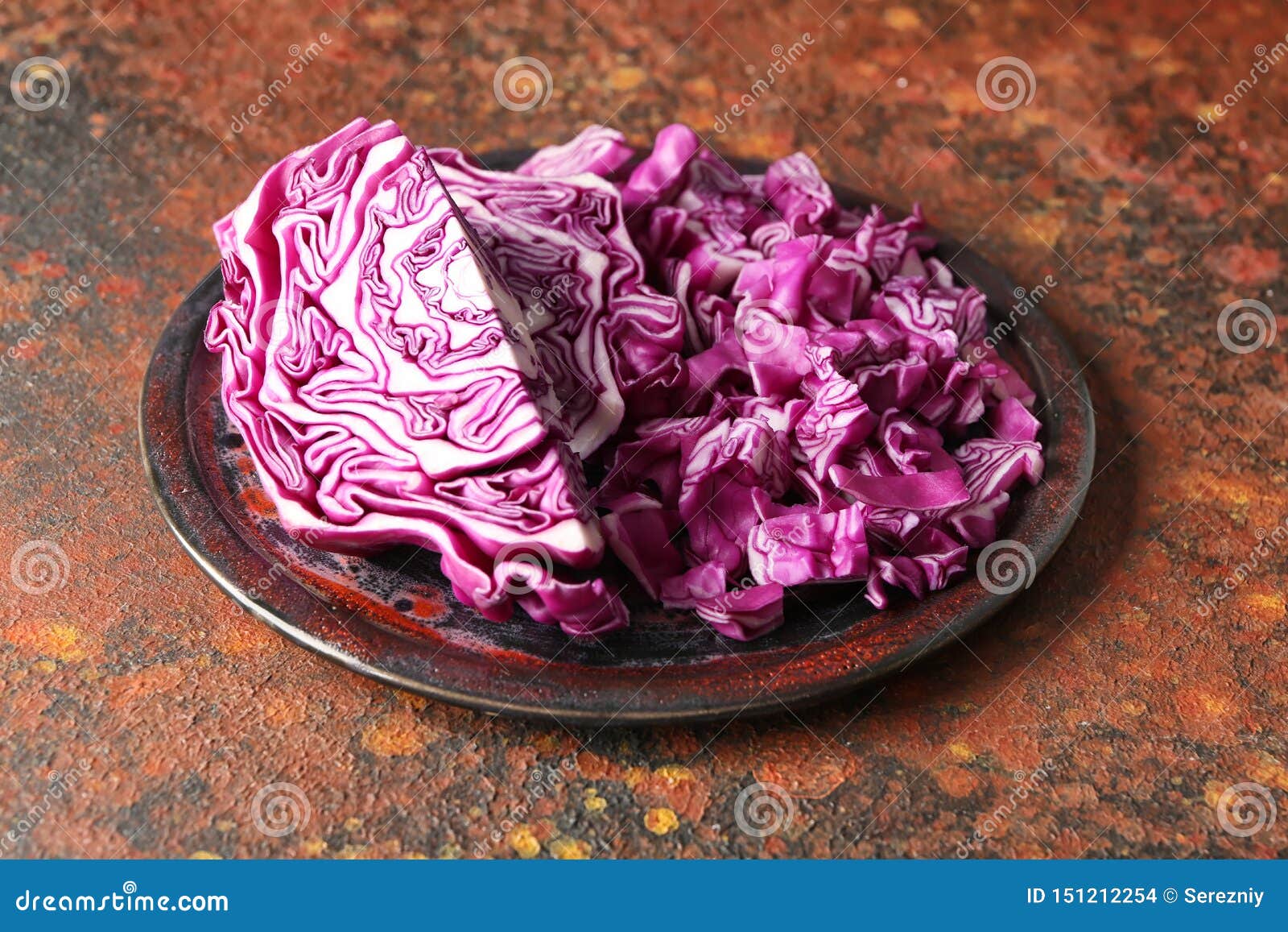 Plate with Cut Red Cabbage on Color Table Stock Photo - Image of food ...