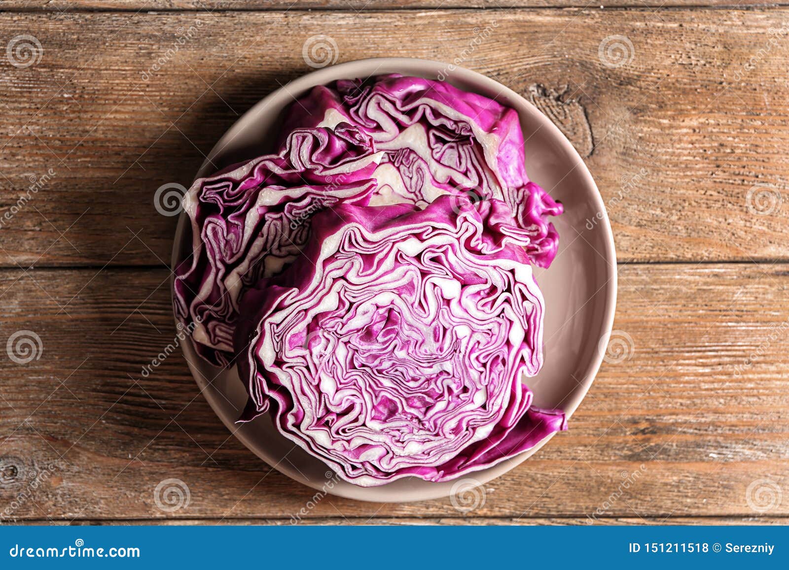 Plate with Cut Red Cabbage on Wooden Table Stock Photo - Image of leaf ...