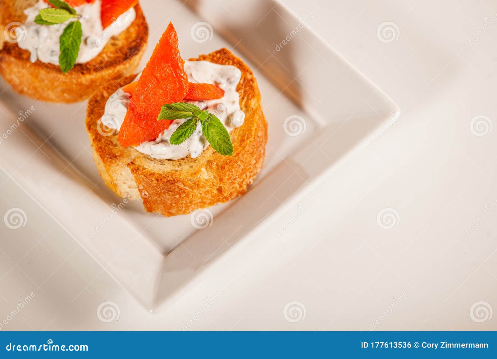Plate of Decorative Salmon Fish on Bruschetta Appetizer Stock Photo ...